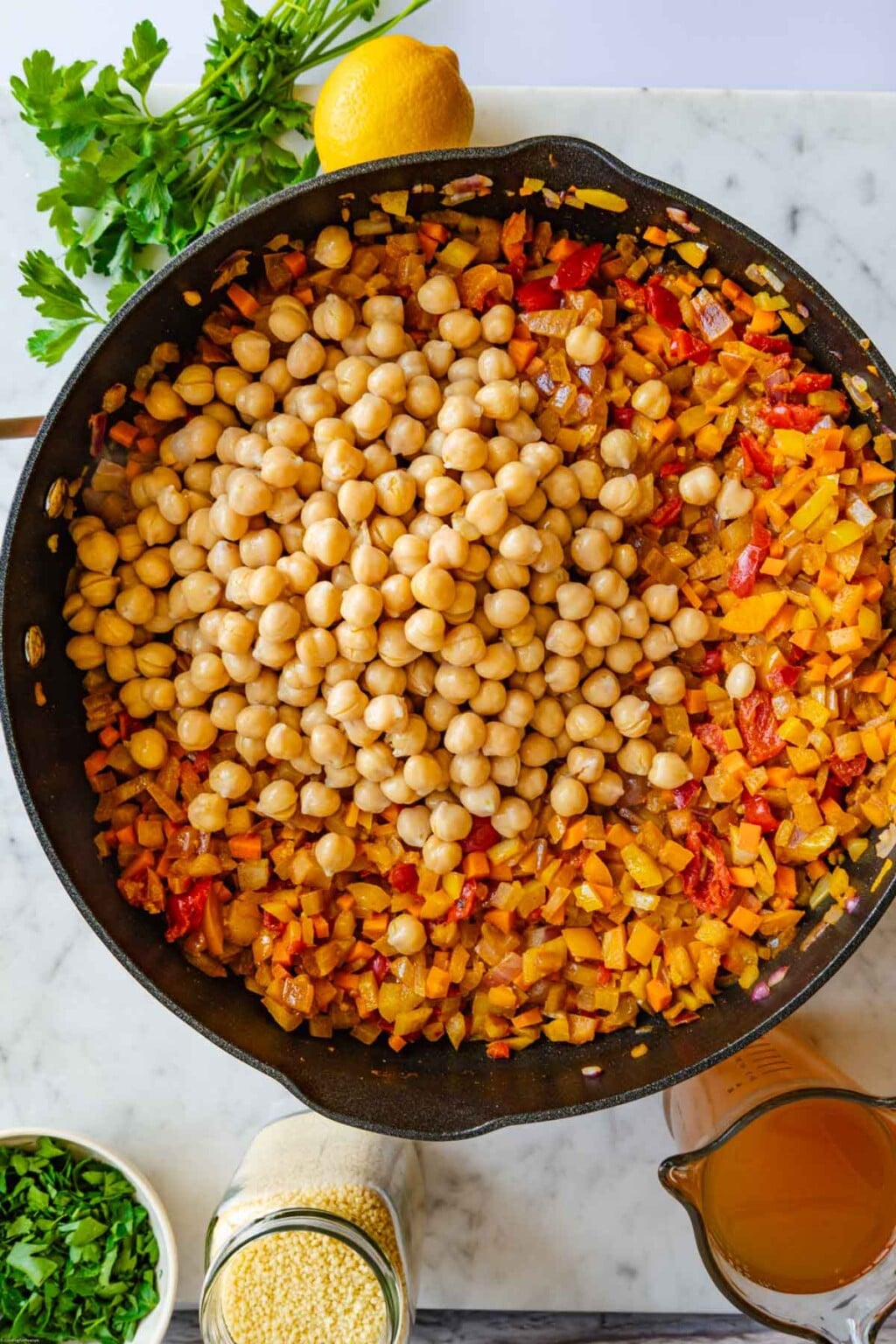 Easy One-Pot Moroccan Couscous with Chickpeas - Cooking For Peanuts