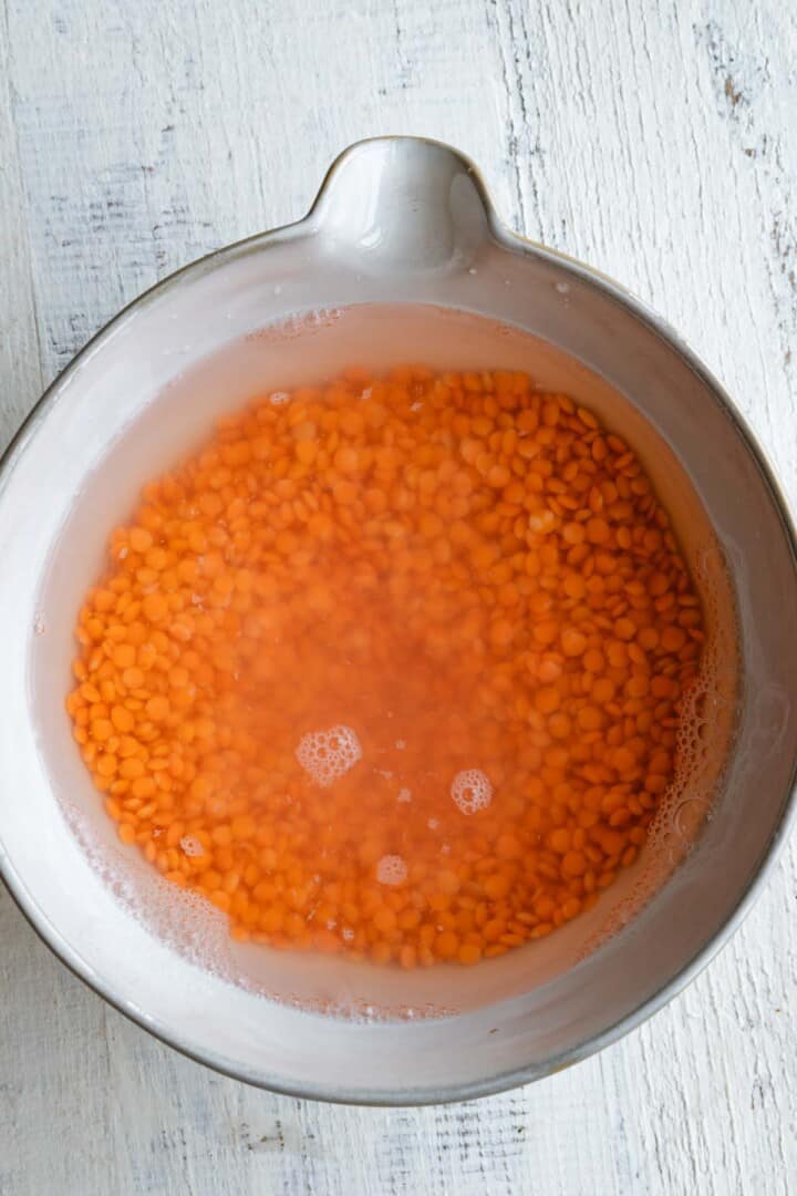 High-Protein Red Lentil Soup with Carrots & Greens - Cooking For Peanuts